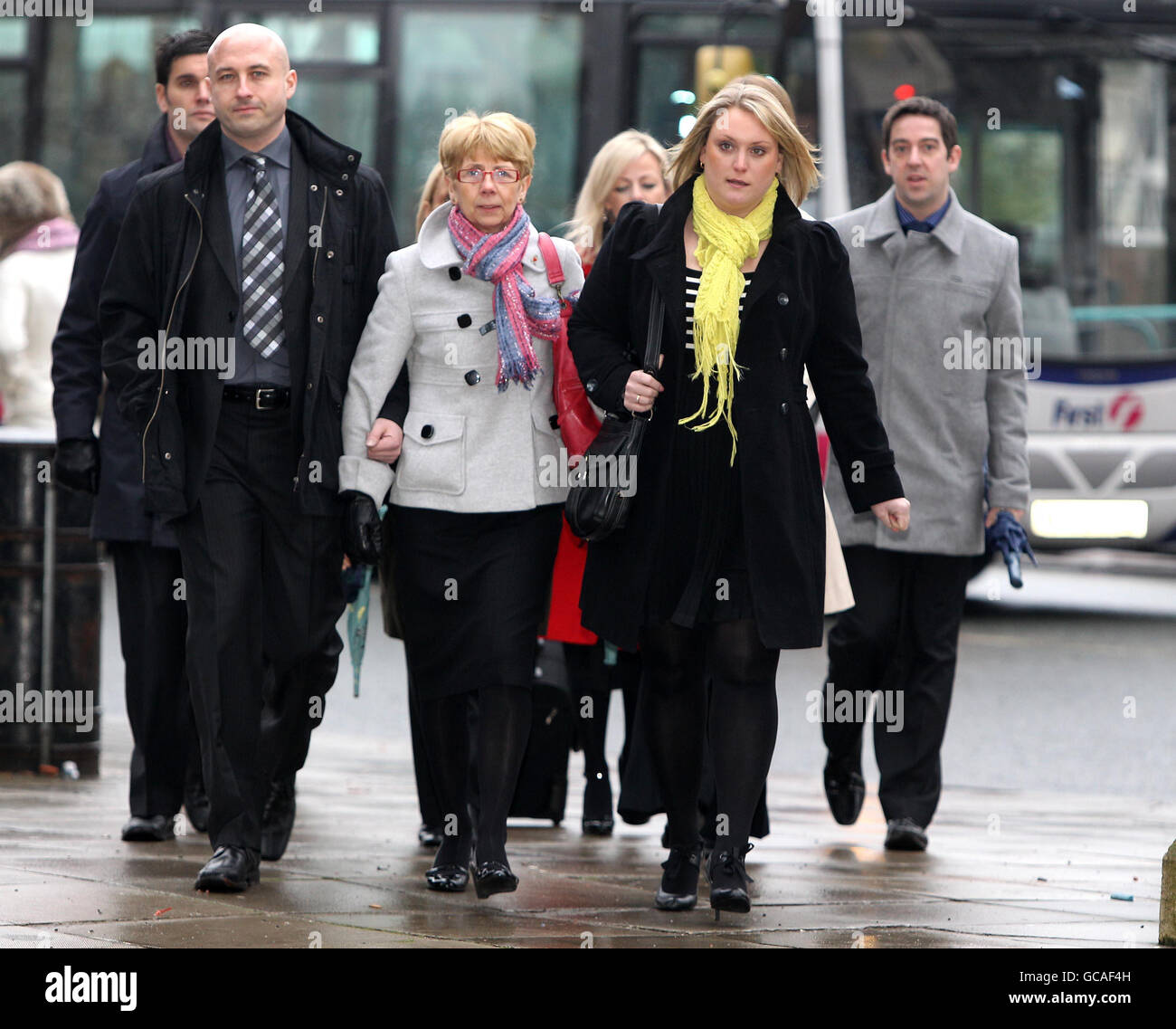 Joanne Terry (far right) arrives at the inquest into her husband Pc Ian ...