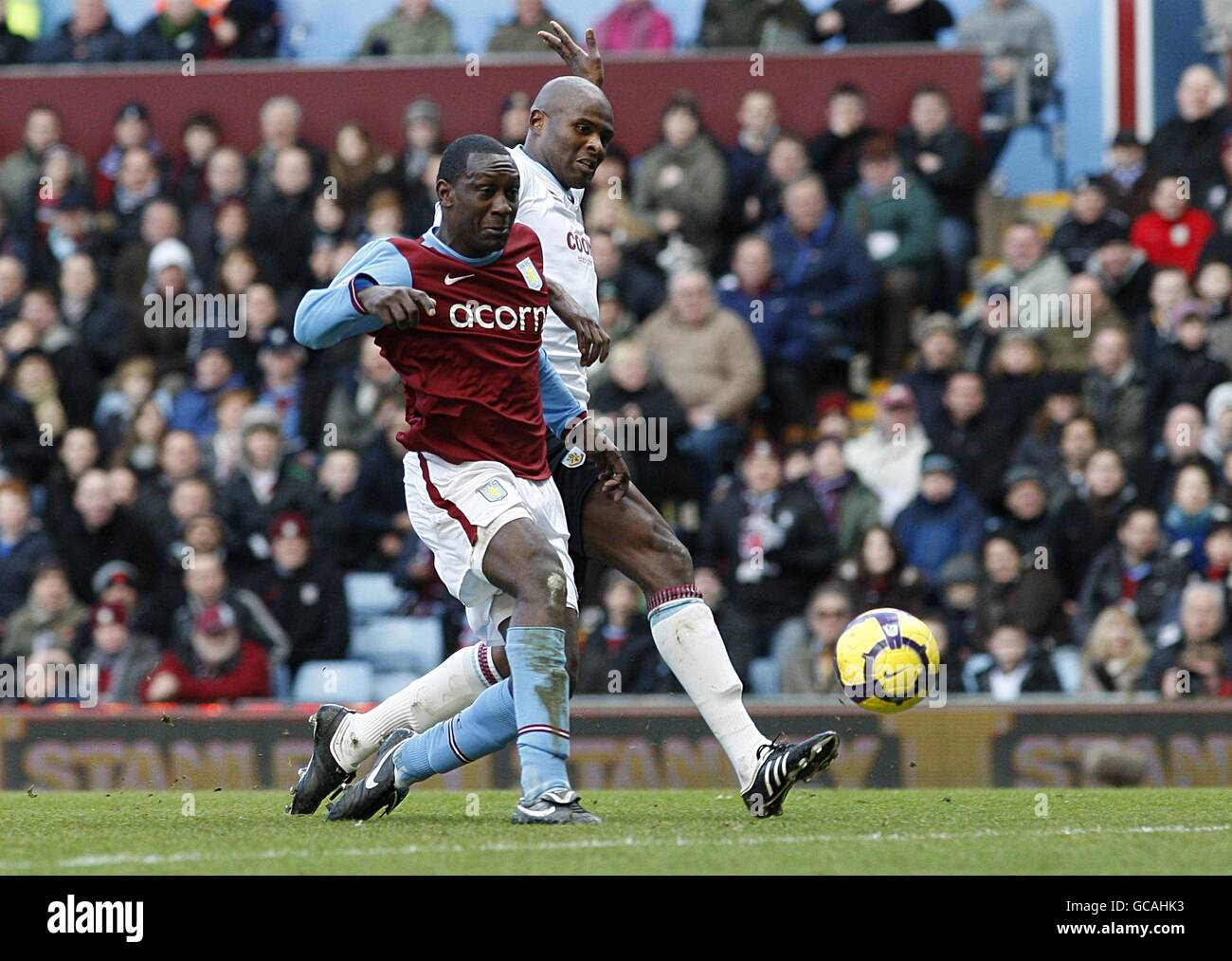 Aston Villa's Emile Heskey (left) scores his sides fourth goal of the ...