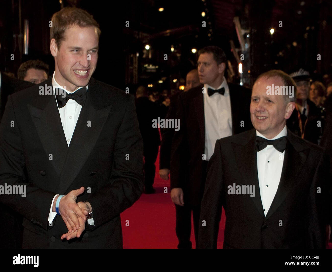 Prince William with BAFTA chairman David Parfitt (right) as he arrives ...