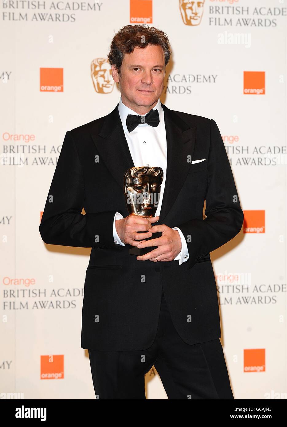 Colin Firth with the award for Best Actor, received for A Single Man at ...