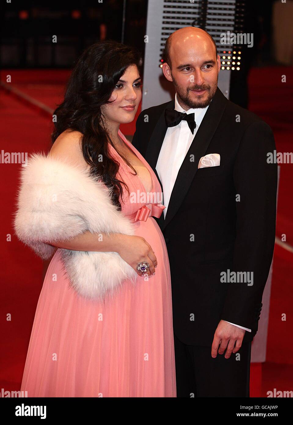 Daniel Dubiecki and guest arriving for the Orange British Academy Film ...