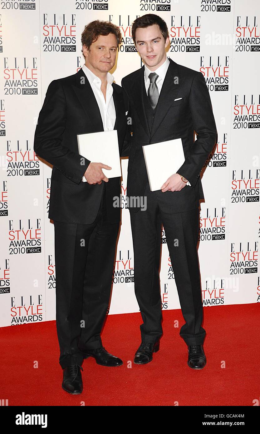 Colin Firth with his Best Actor Award, and presenter Nicholas Hoult ...