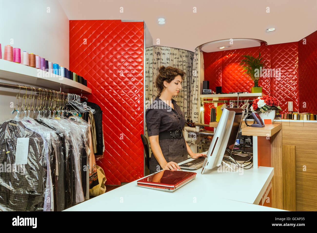 A woman working in the store Stock Photo - Alamy