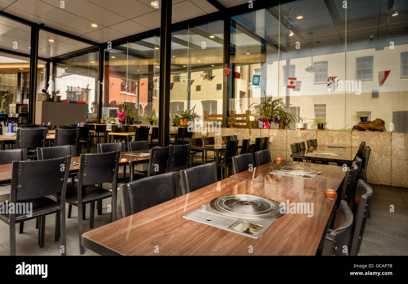 International restaurant in the building with walls of glass and large ...