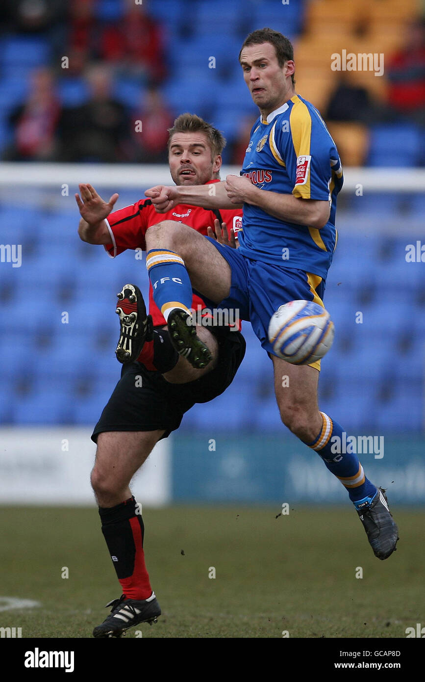 Shrewsbury Town's Dave Hibbert and Bournemouth's Alan Connell battle ...