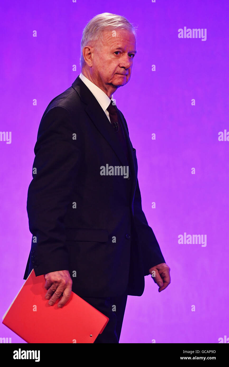 Sir John Chilcot leaves the stage after presenting The Iraq Inquiry ...