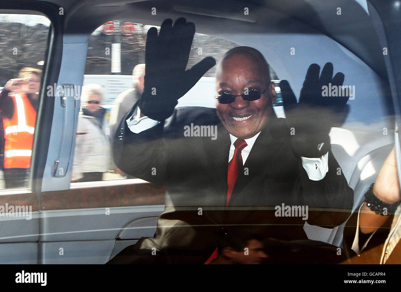 South African President Jacob Zuma waves as he leaves after a visit to ...