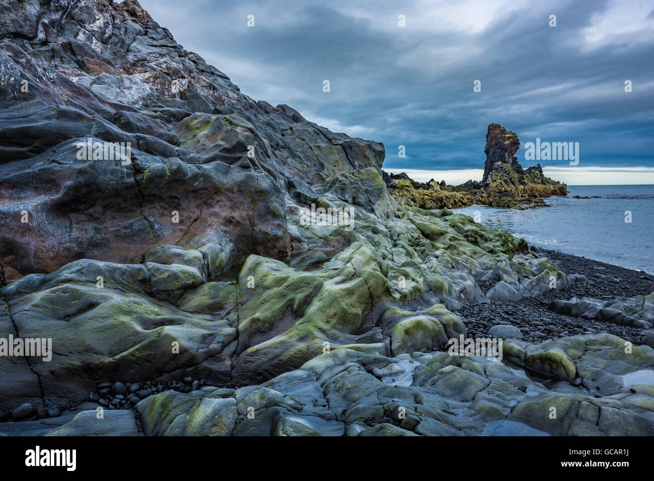 Lava rock formations at the Djupalonssandur beach at the foot of the ...