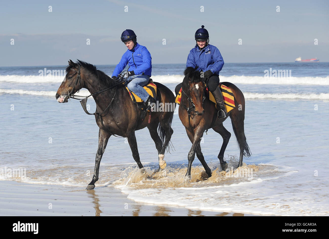Horse rider on beach hi-res stock photography and images - Alamy
