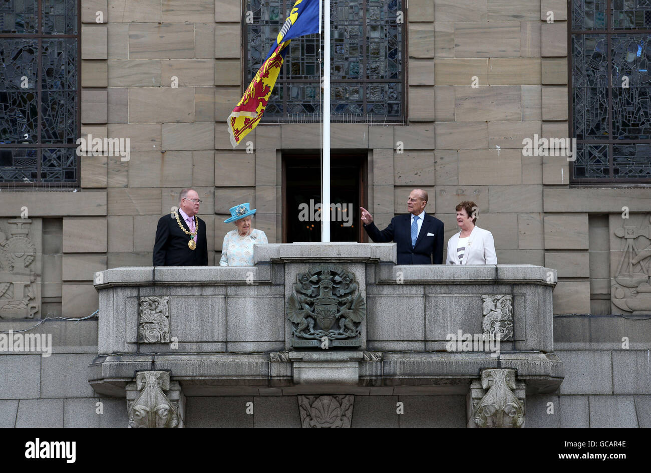 Queen Elizabeth II and the Duke of Edinburgh appear on the balcony of ...