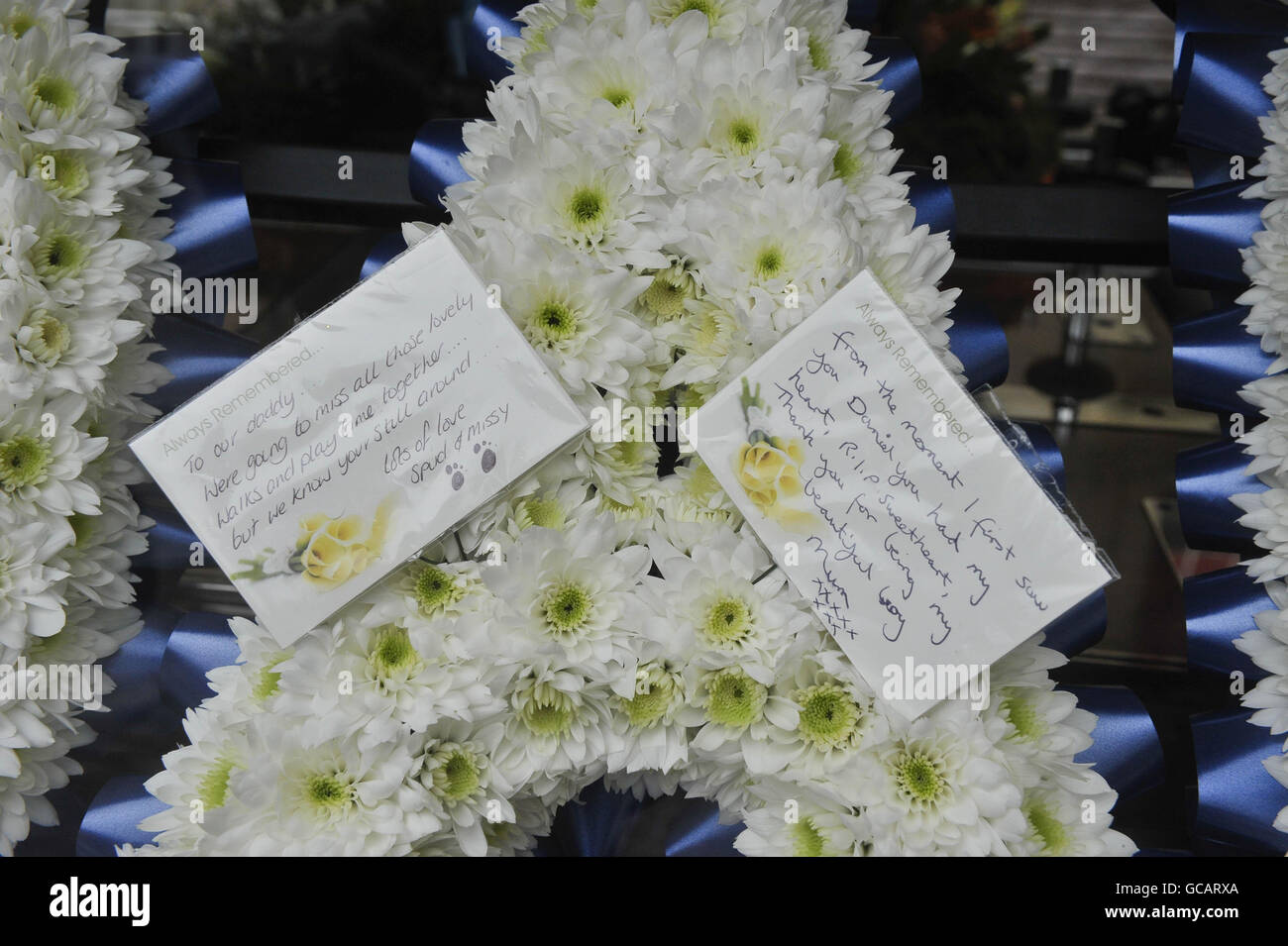 Messages on a floral tribute at the funeral of Captain Daniel Read, 31 ...