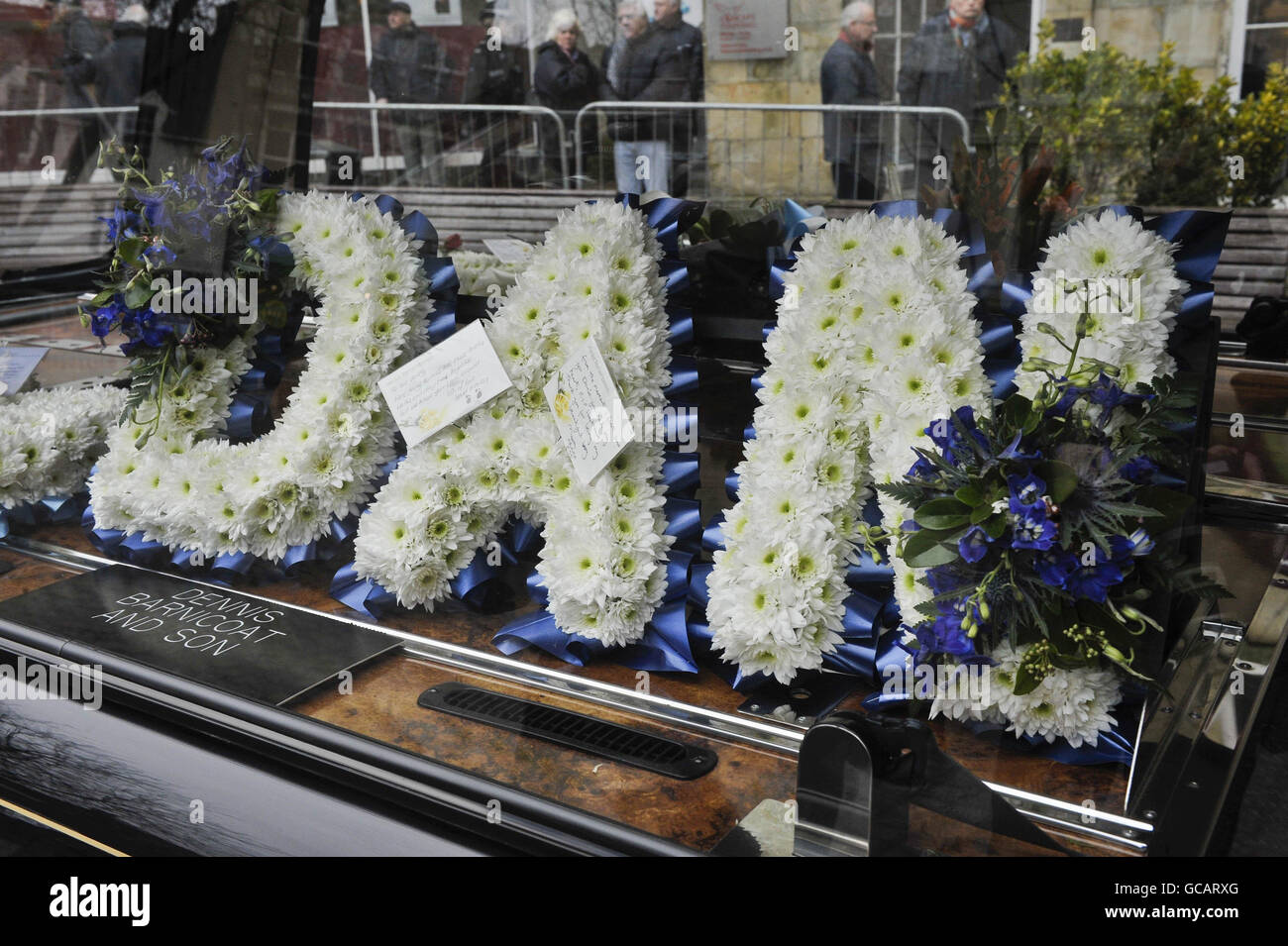 Messages on a floral tribute at the funeral of Captain Daniel Read, 31 ...