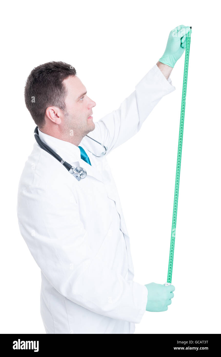 Male doctor or nutritionist holding and measuring with body ruler ...