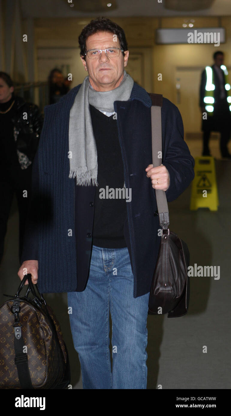 England manager fabio capello arrives at heathrow airport hi-res stock ...