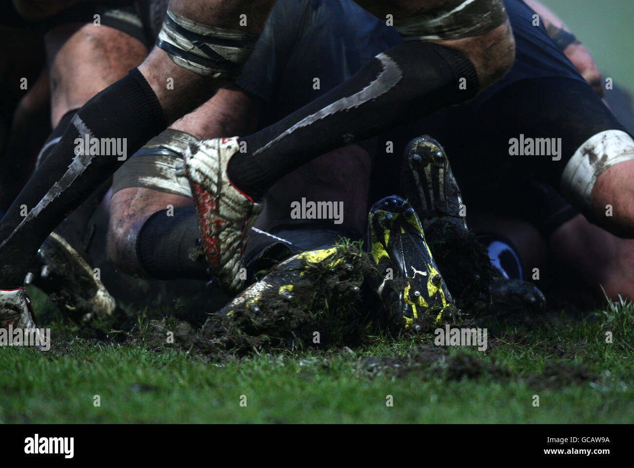 Two legs and football boots hi-res stock photography and images - Alamy