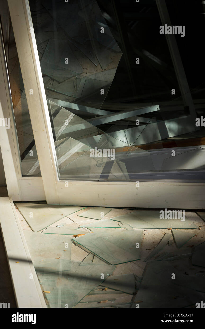 Broken glass window Stock Photo - Alamy