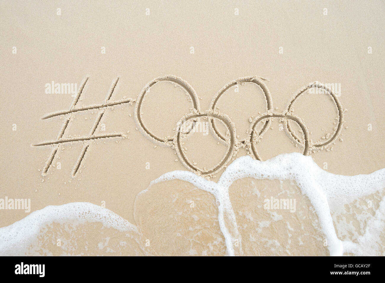 RIO DE JANEIRO - APRIL 4, 2016: Olympic rings drawn with a hashtag in ...