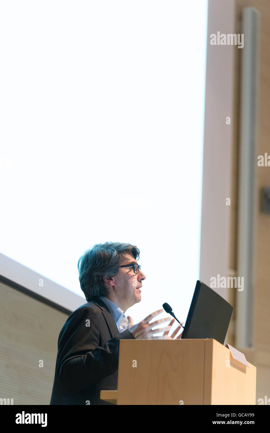 Speaker giving talk on podium at Business Conference Stock Photo - Alamy