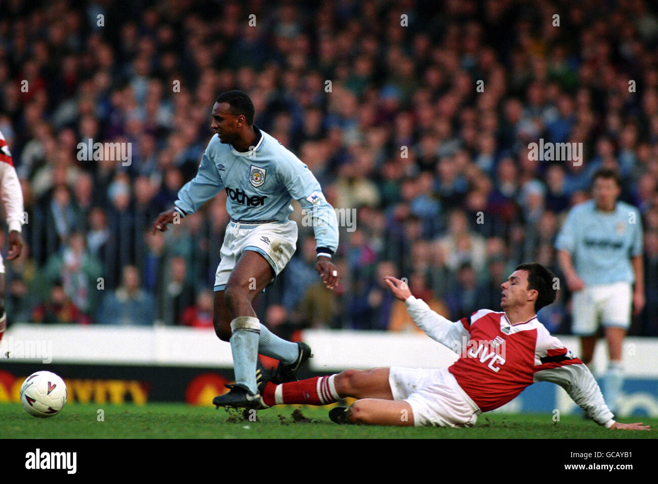 Manchester City's David Rocastle and Arsenal's David Hillier battle for ...