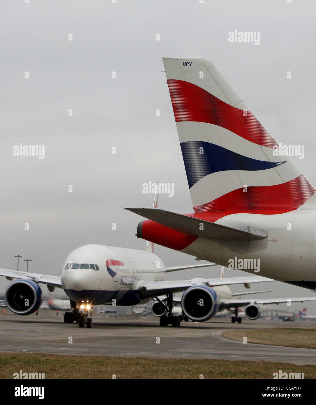British airways planes taxi at heathrow airport in middlesex hi-res ...