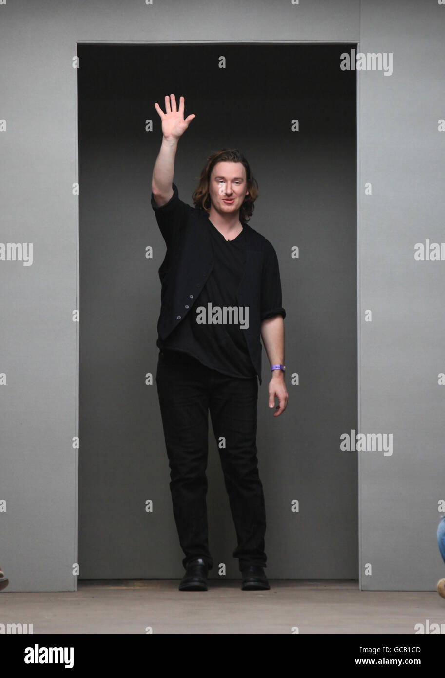 Designer Mark Fast at the end of his Autumn/Winter 2010 show, at the ...