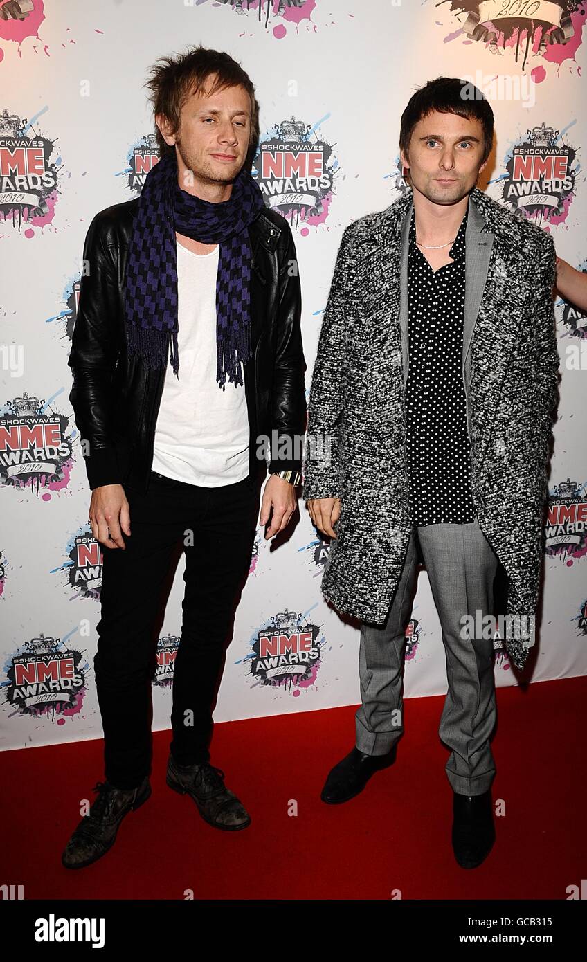 Dominic Howard (left) and Matt Bellamy of Muse arriving for the 2010 ...