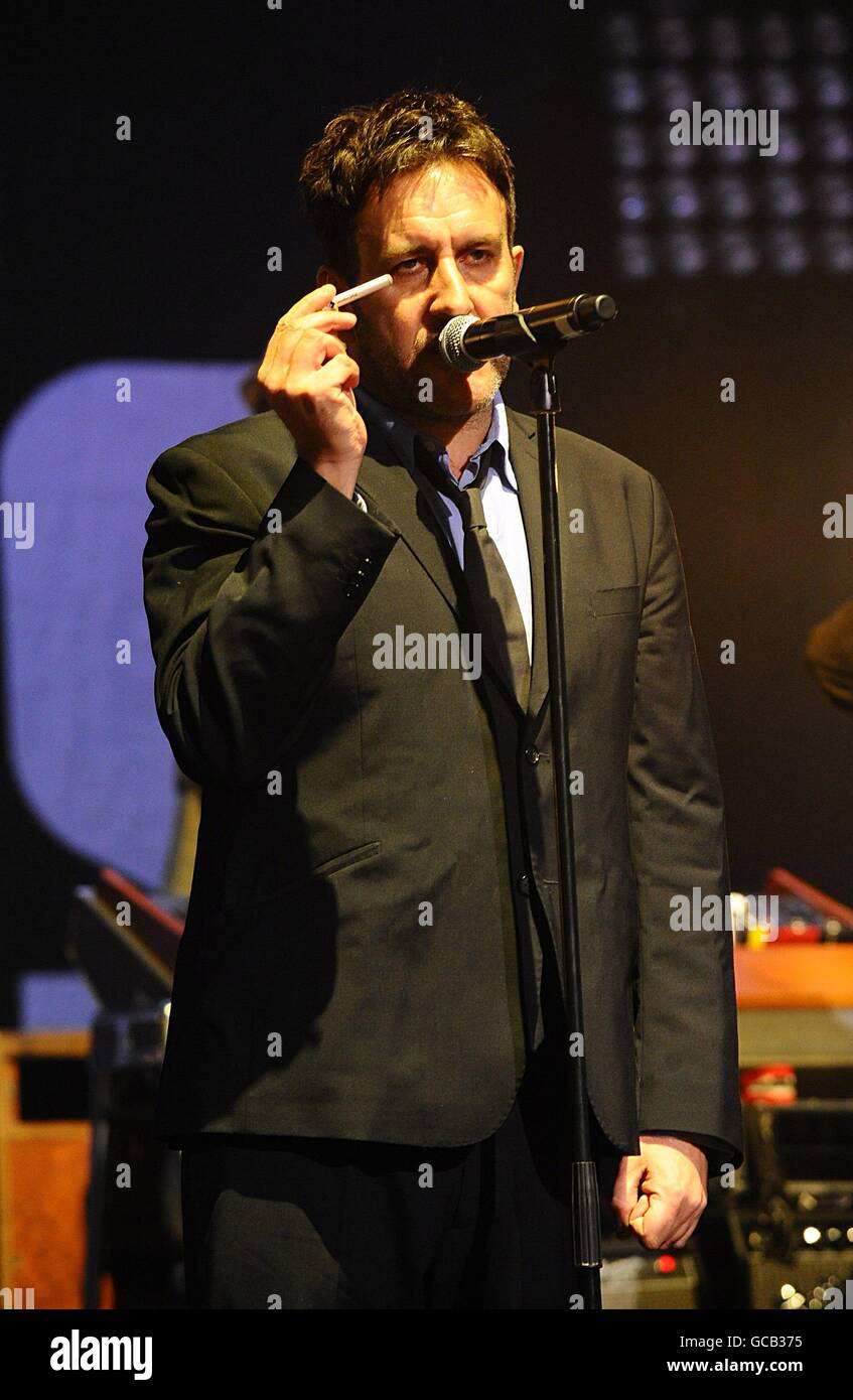 Terry Hall of The Specials performing on stage during the 2010 NME ...