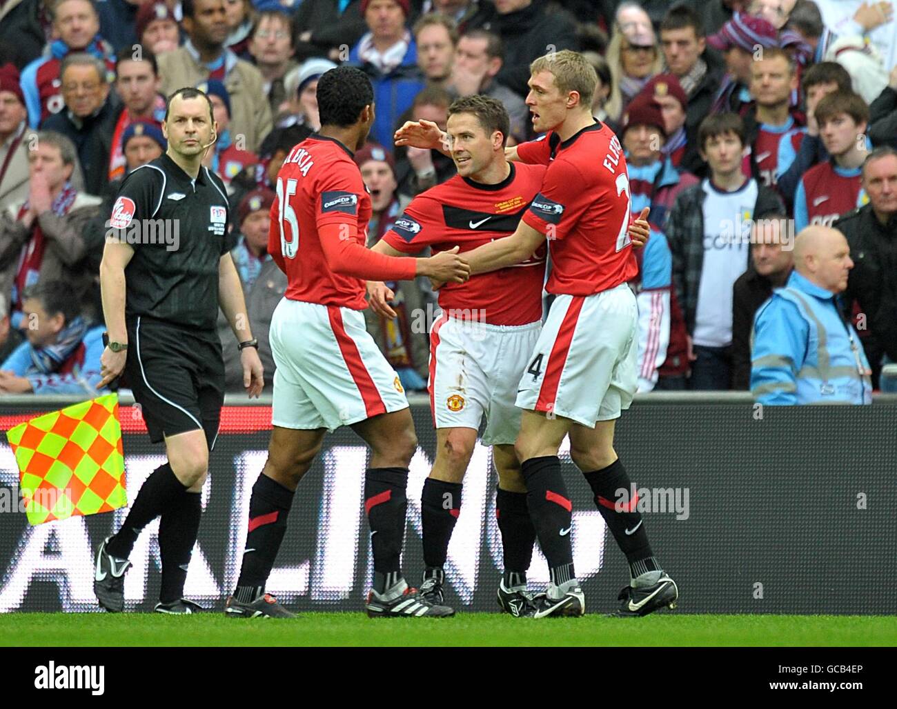 Manchester United's Michael Owen (centre) celebrates with team mates ...