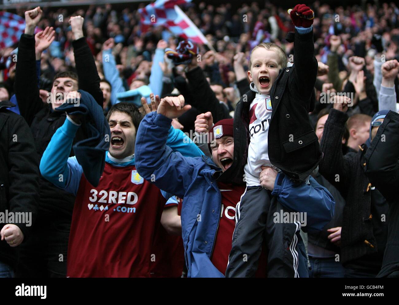 Aston villa fans celebrate in the stands hi-res stock photography and ...