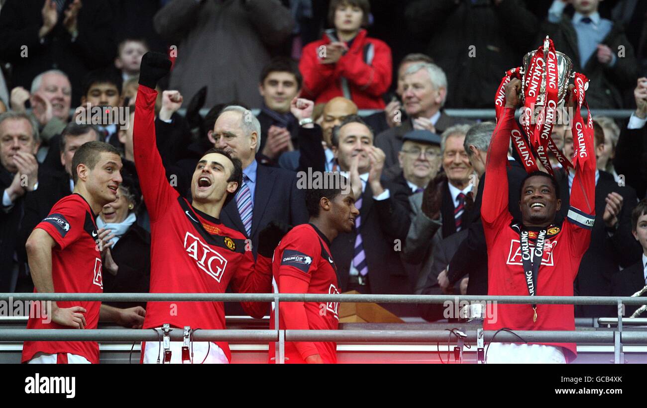 Manchester united captain patrice evra lifts the carling cup trophy hi ...
