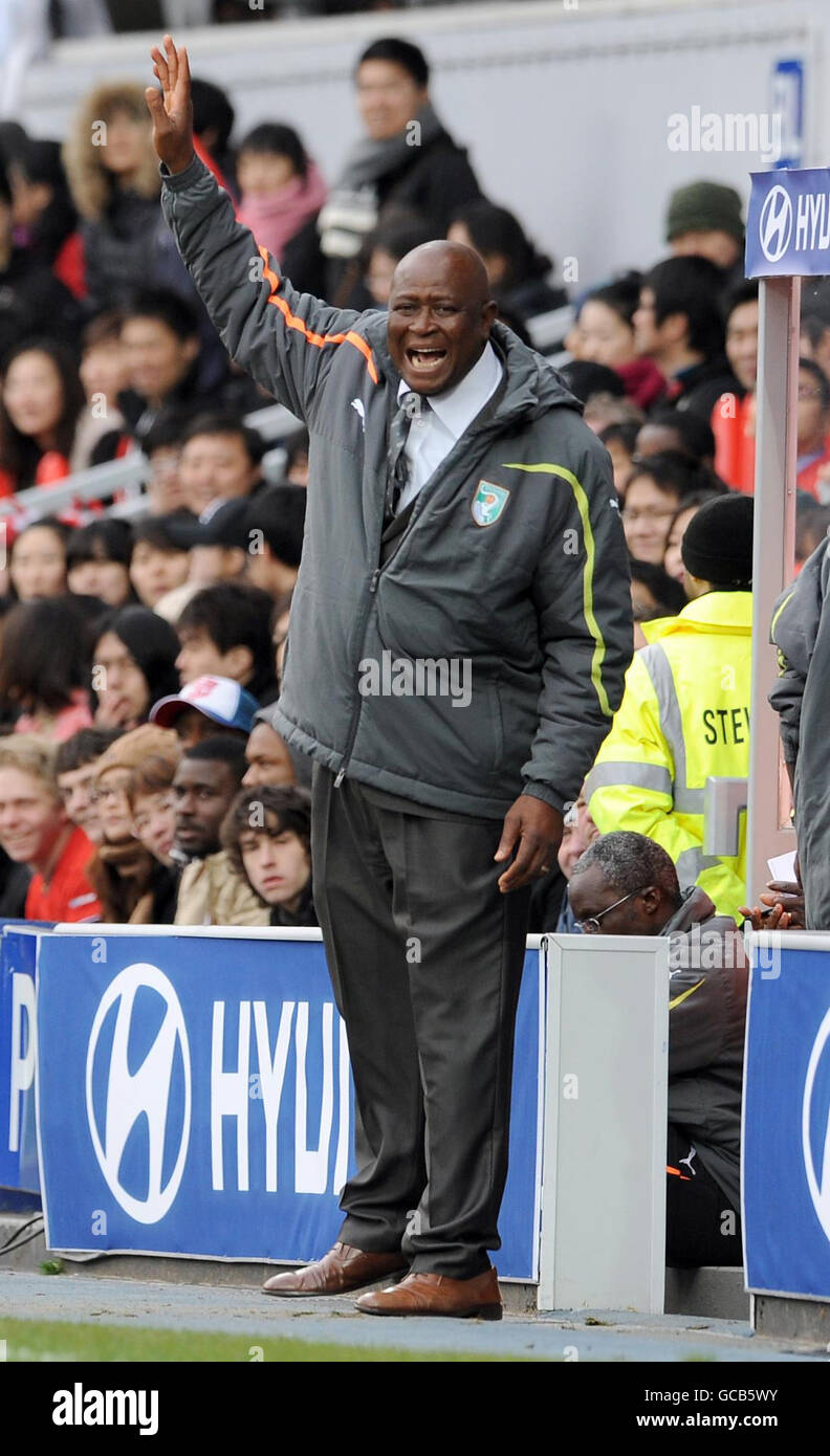 Ivory Coast coach Kouadio Georges reacts on the touchline during the ...