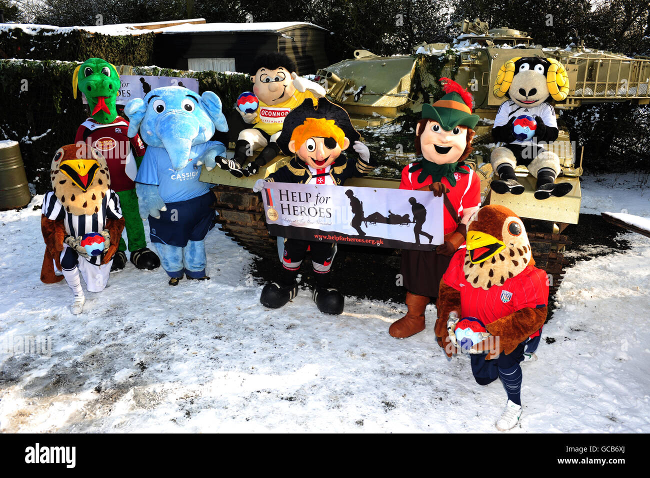 (left to right) West Bromwich Albion mascot Baggie Bird, Northampton ...