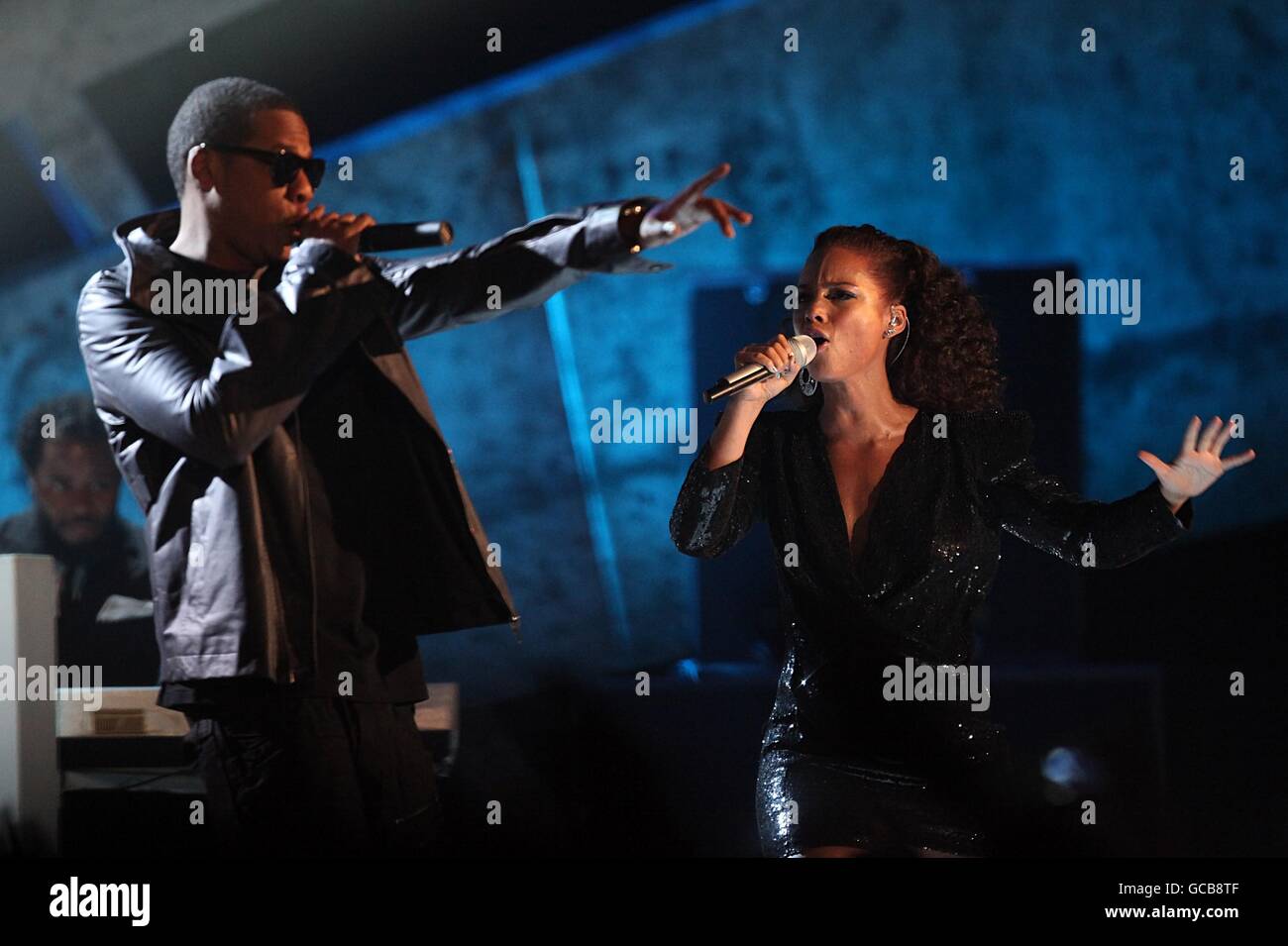 Jay-Z and Alicia Keys perform on stage during the BRIT Awards 2010, at ...