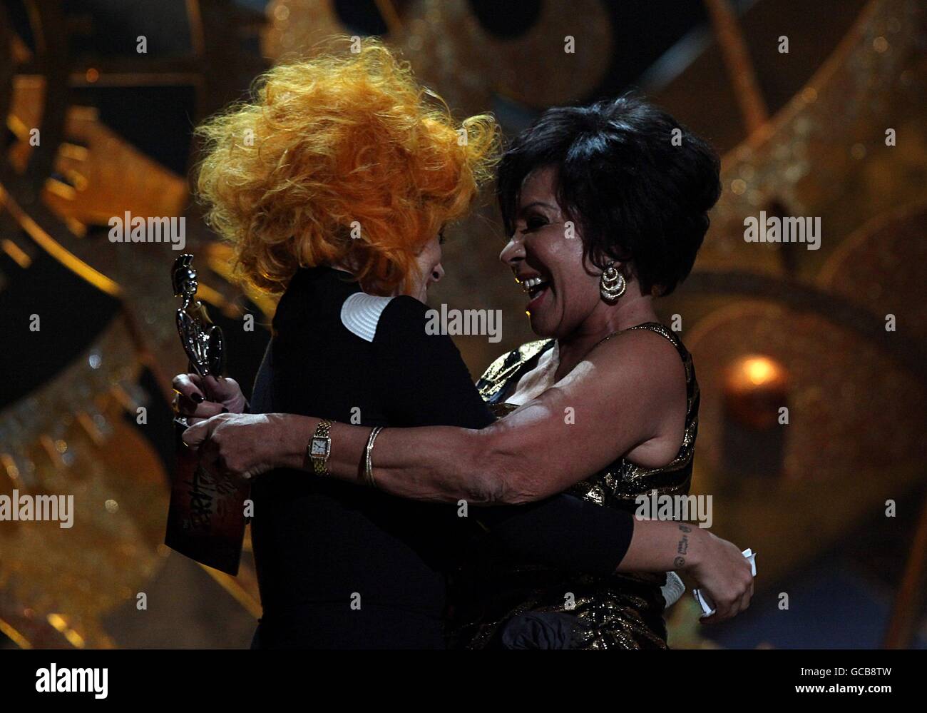 Lily Allen collects the award for British Female Solo Artist from Dame ...