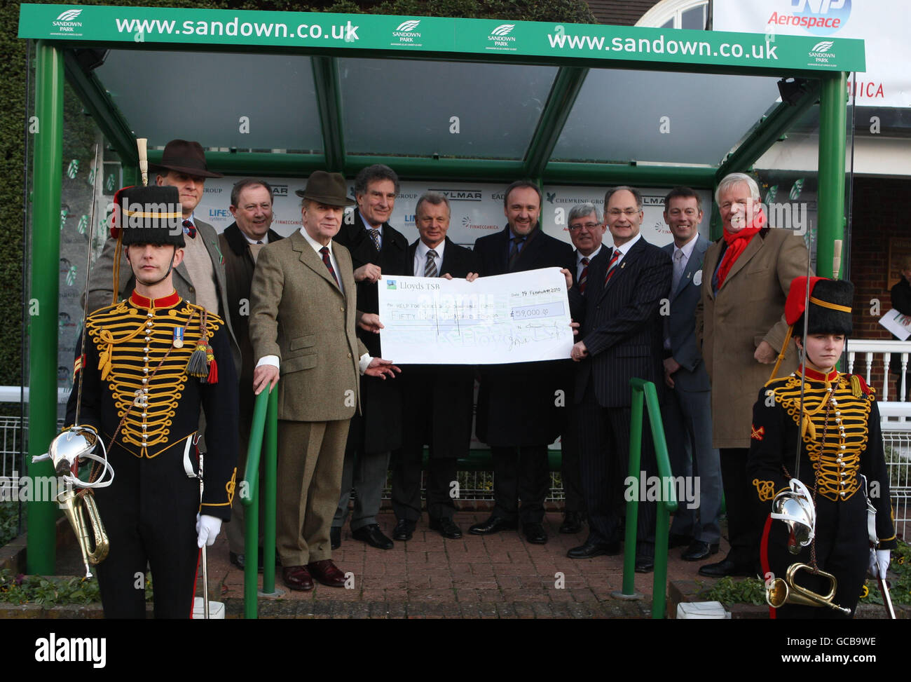 A cheque of money raised for Help for Heroes is shown to the press ...