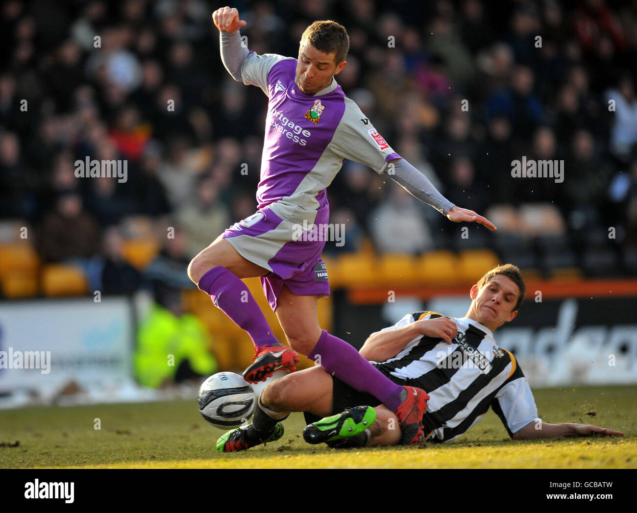 Port Vale's Kris Taylor tackles Barnet's John O'Flynn Stock Photo - Alamy