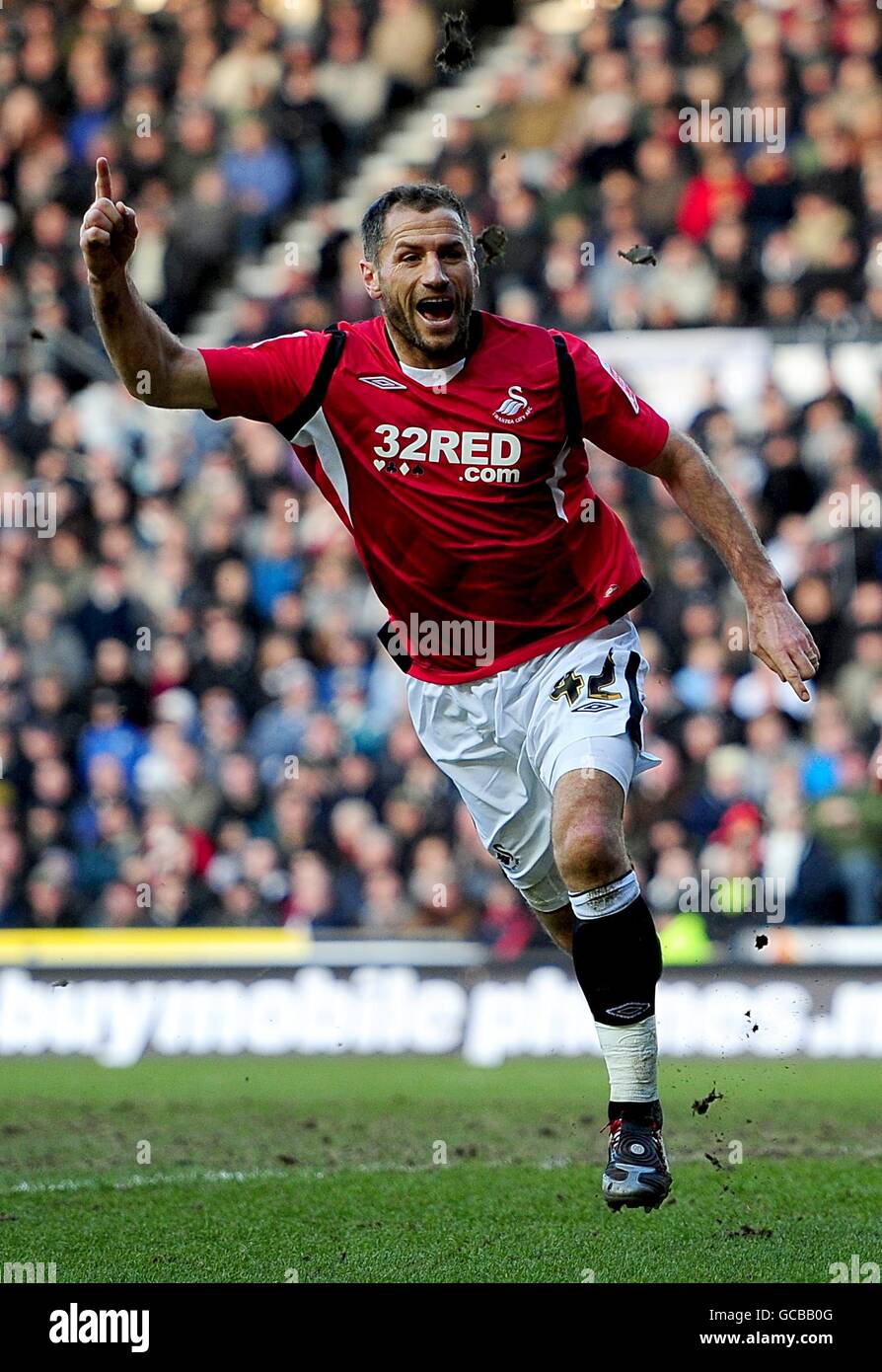 Swansea City's Shefki Kuqi celebrates after scoring the first goal of ...