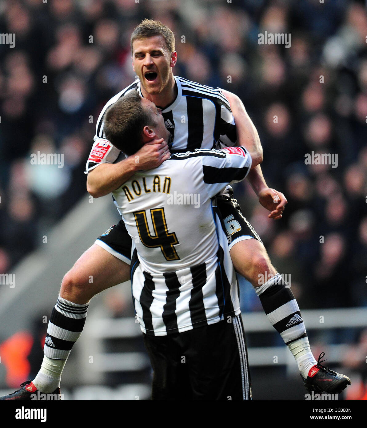 Newcastle's Ryan Taylor celebrates his side third goal with Kevin Nolan ...