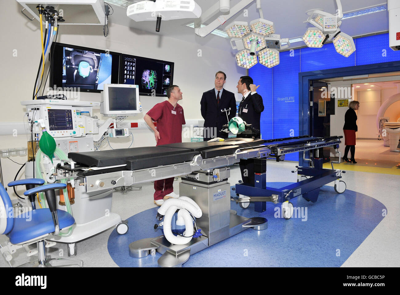 Prince William (centre) talks to theatre manager Steve Allen (left) and ...