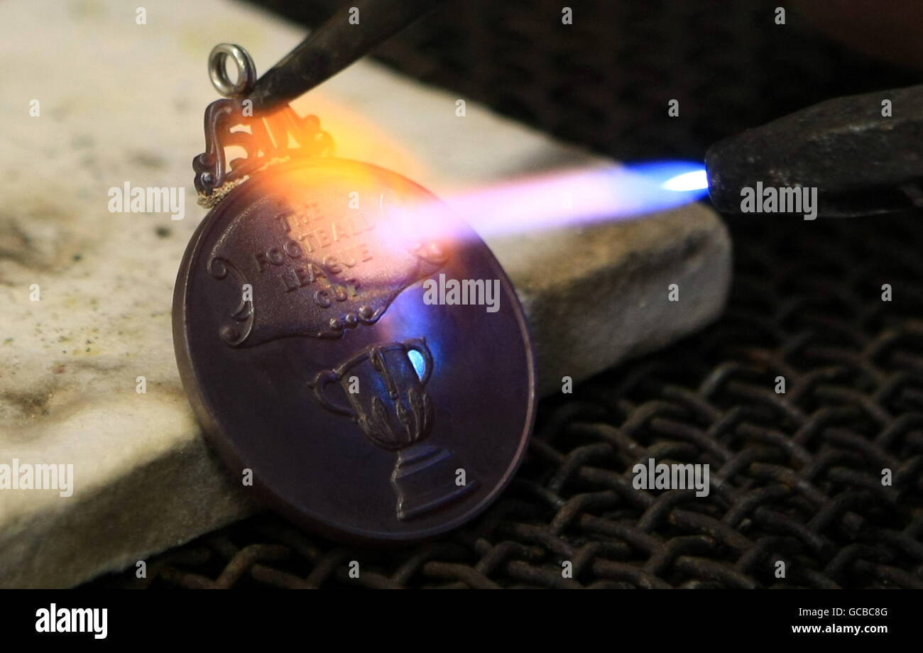 Soccer - Carling Cup Winners Medals Being Made - Vaughtons Stock Photo ...