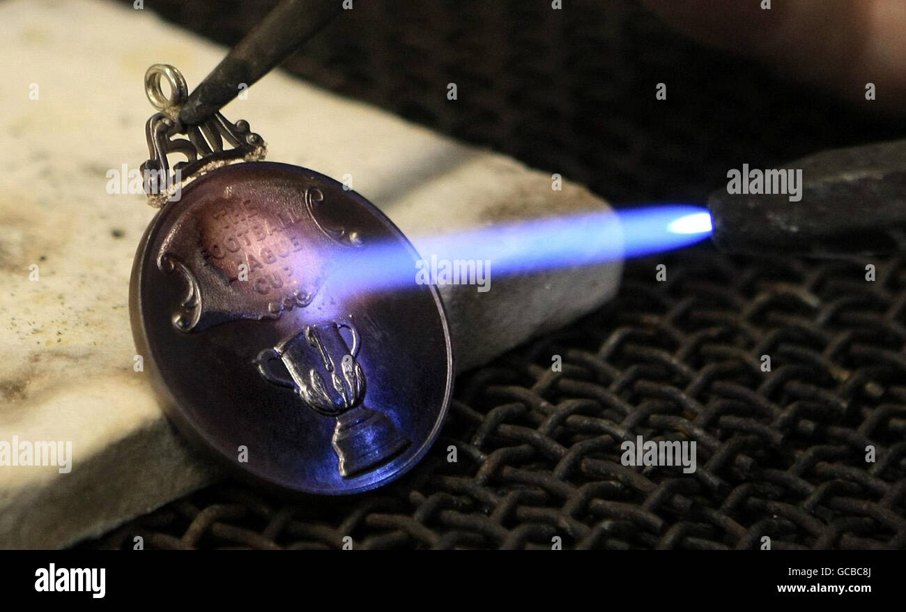 Soccer - Carling Cup Winners Medals Being Made - Vaughtons Stock Photo ...