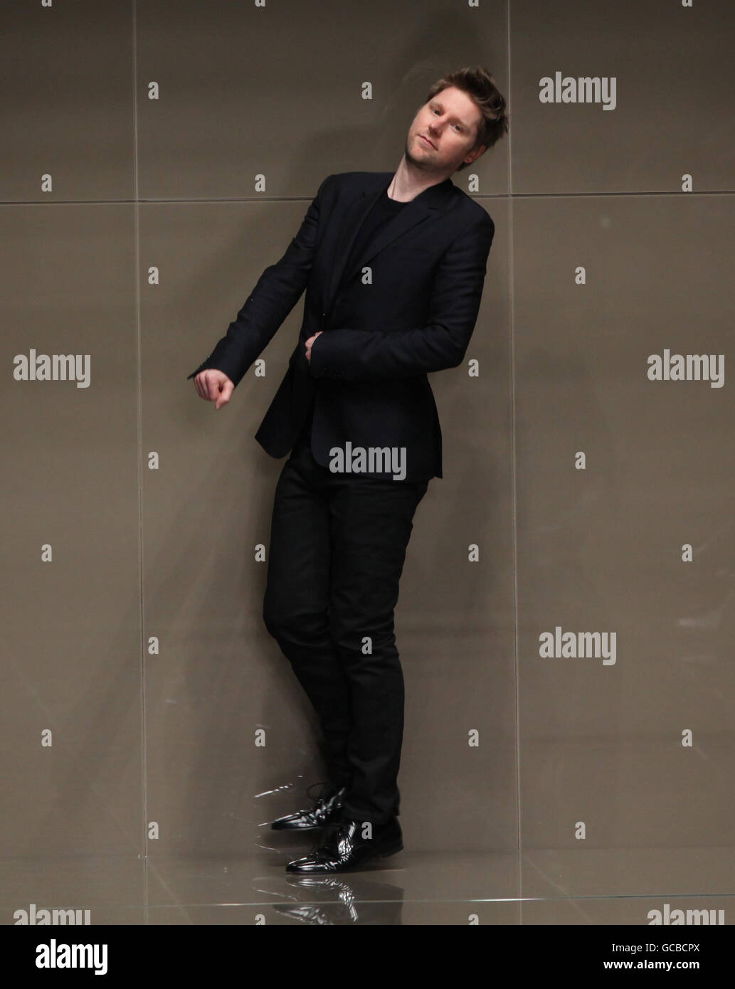 Burberry suit hi-res stock photography and images - Alamy