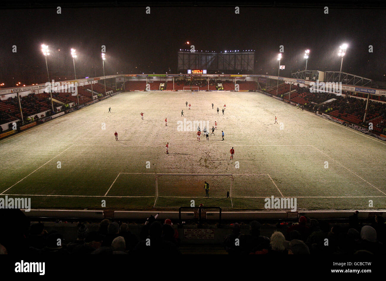 Walsall's Clayton Ince retrieves the ball from his net as Yeovil's ...