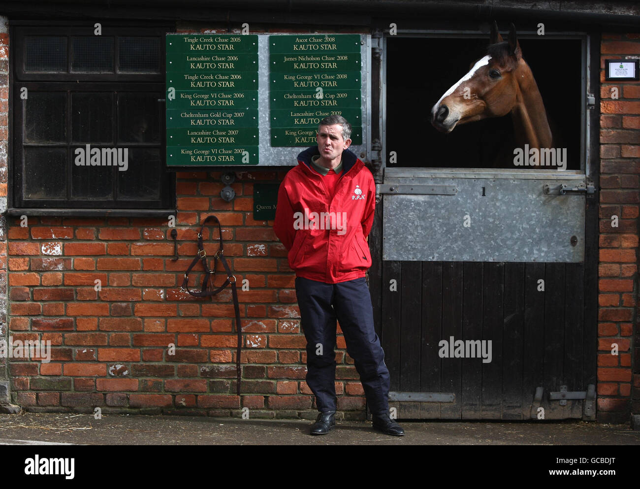 Head lad Clifford Baker with Kauto Star during the stable visit at ...