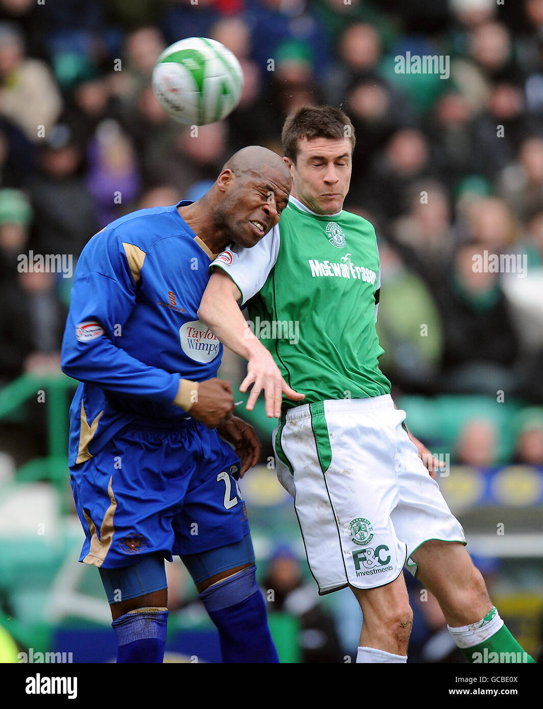 Hibernian's Colin Nish and St Johnstone's Michael Duberry battle for ...