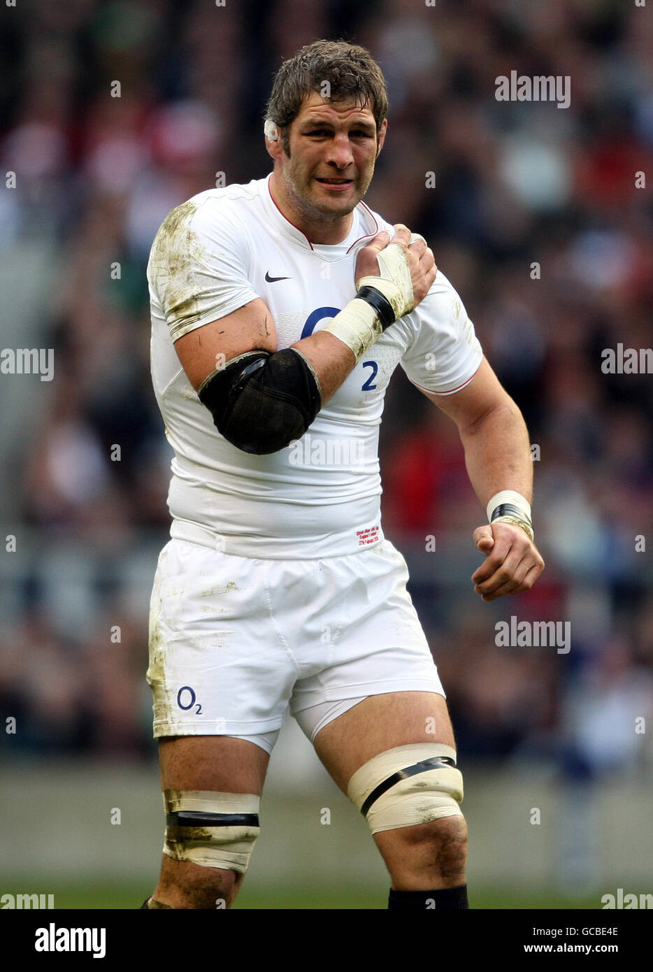 England's Simon Shaw holds his injured shoulder before being replaced ...