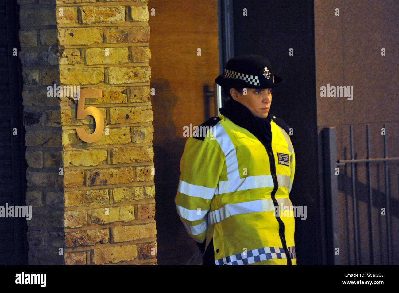 A police officer stands outside address in richford road hi-res stock ...