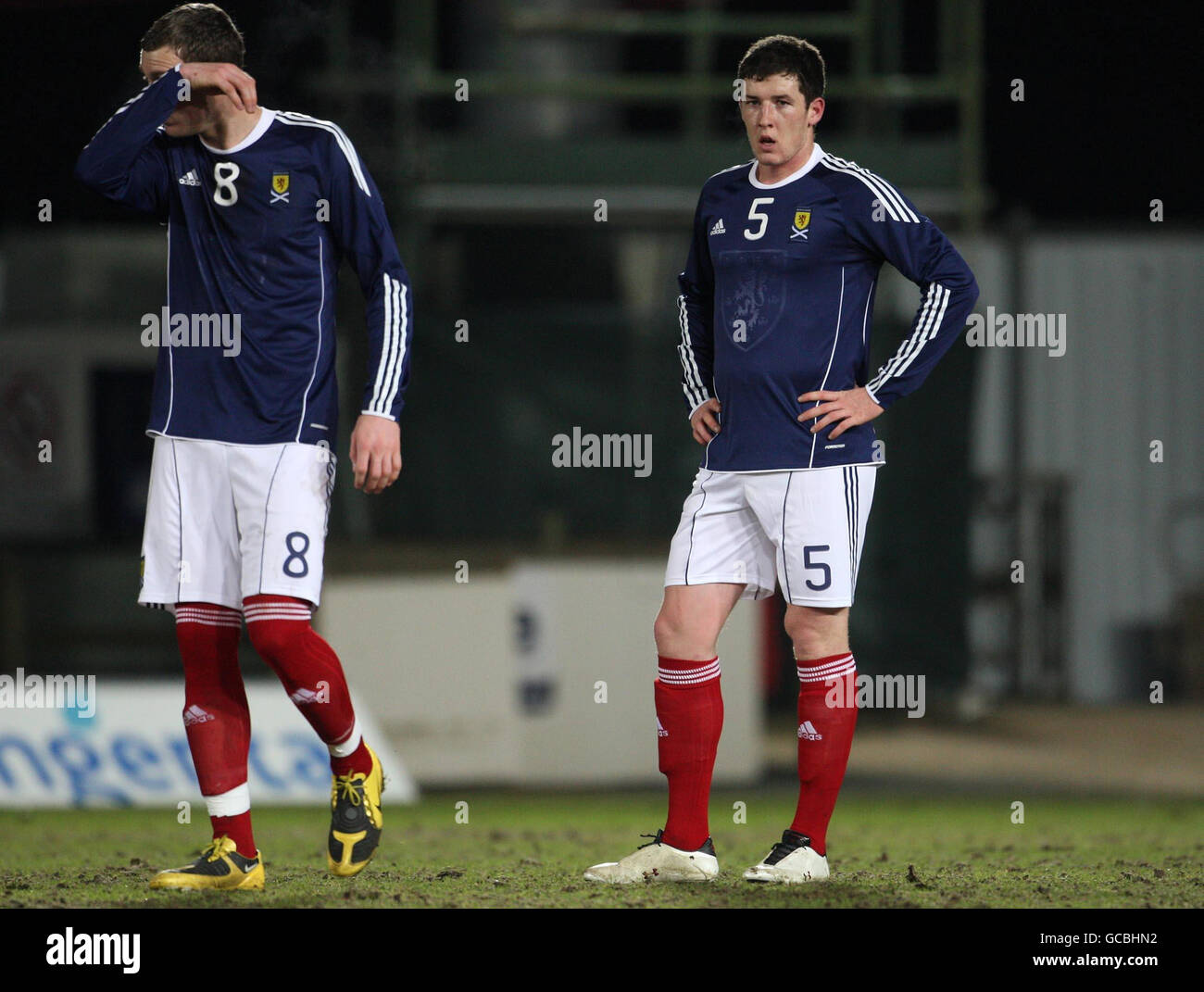 Scotland's Kevin McDonald (left) and Ross Perry stand dejected during ...