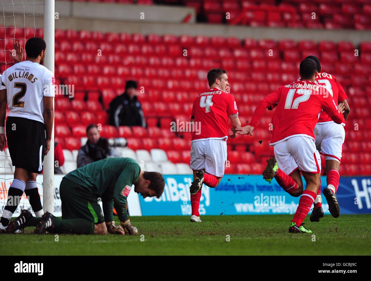 Nottingham Forest's Luke Chambers (centre) runs to celebrate scoring ...