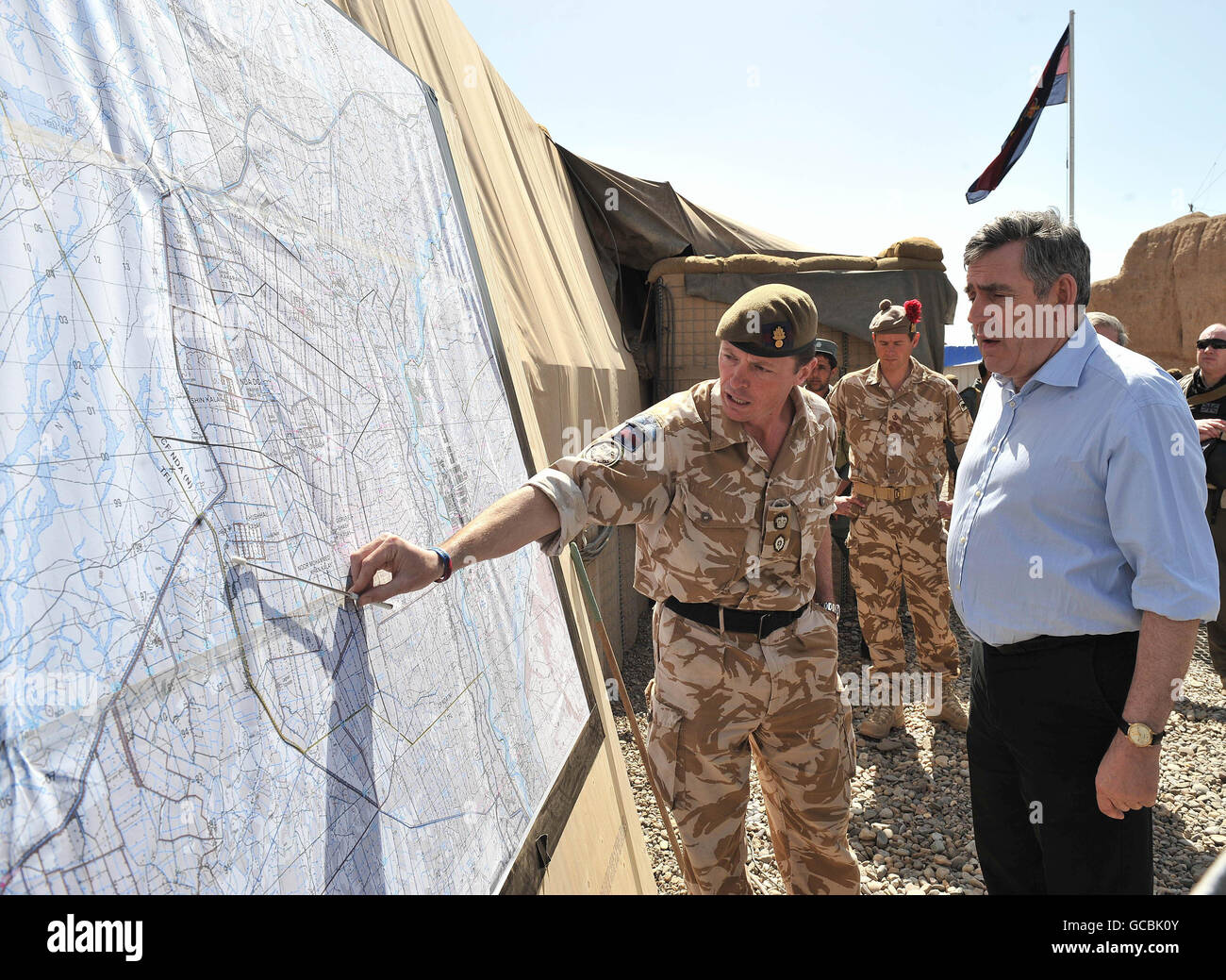Prime Minister Gordon Brown is shown a map of Helmand Province by ...
